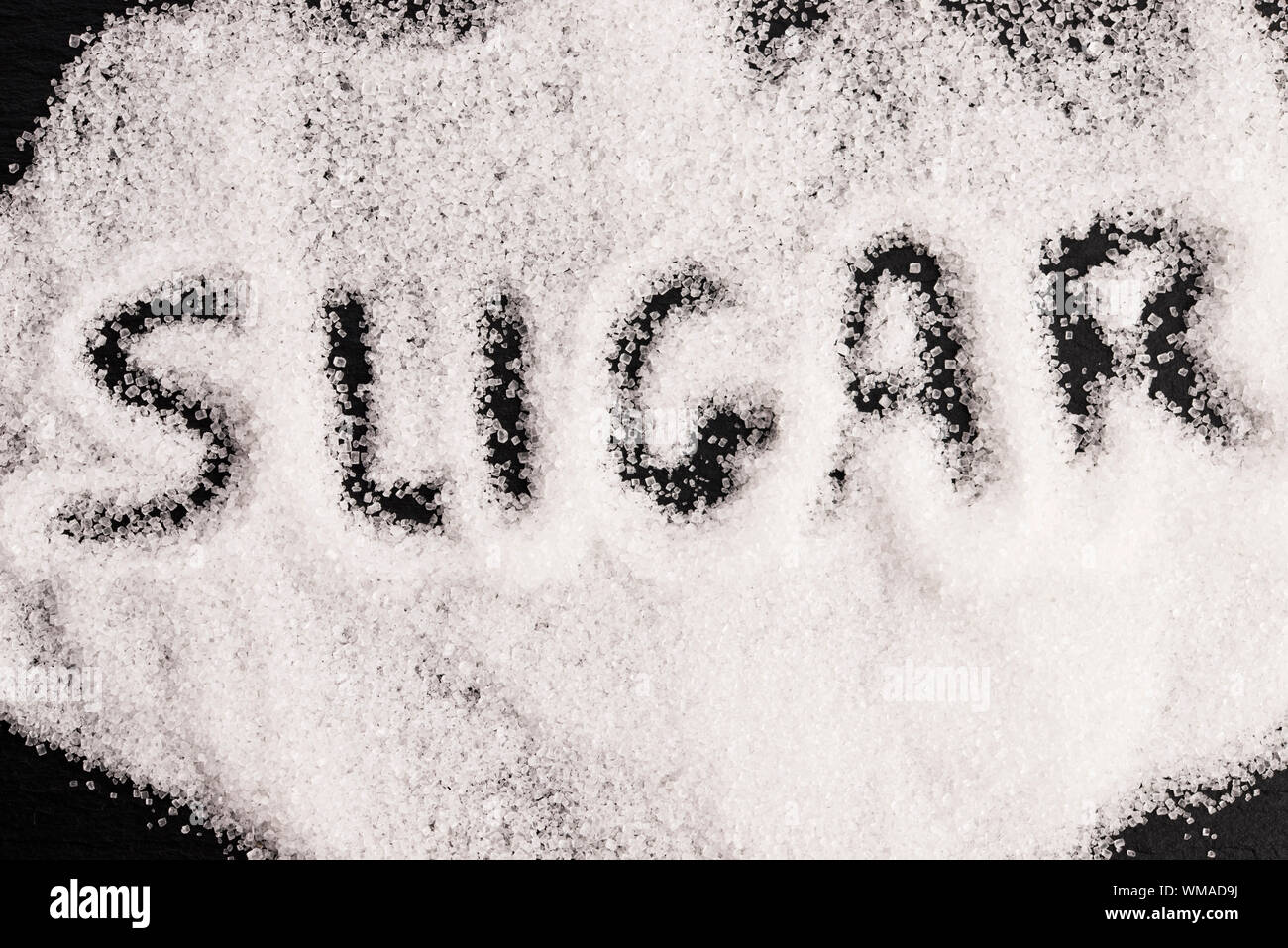 Word sugar written pile hi-res stock photography and images - Alamy