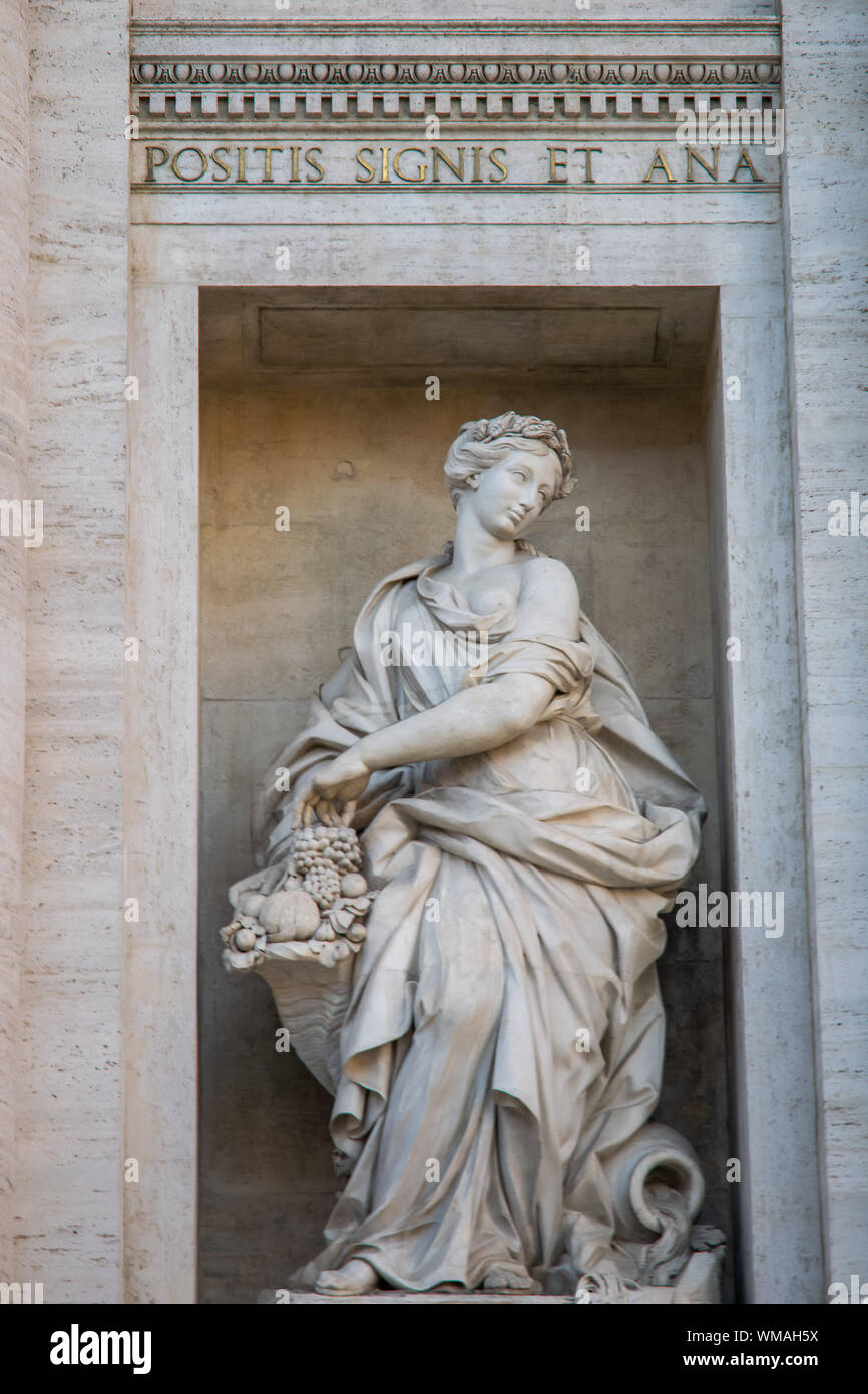 Statue representing the abundance in the Trevi Fountain or Fontana di ...