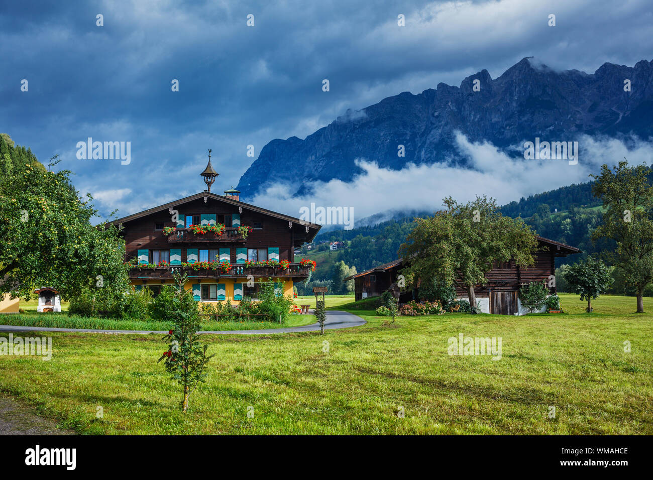 Summer landscape in Alps with traditional Austrian house Stock Photo ...