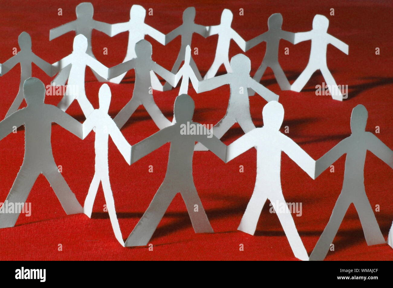 team of paper people having a party Stock Photo - Alamy