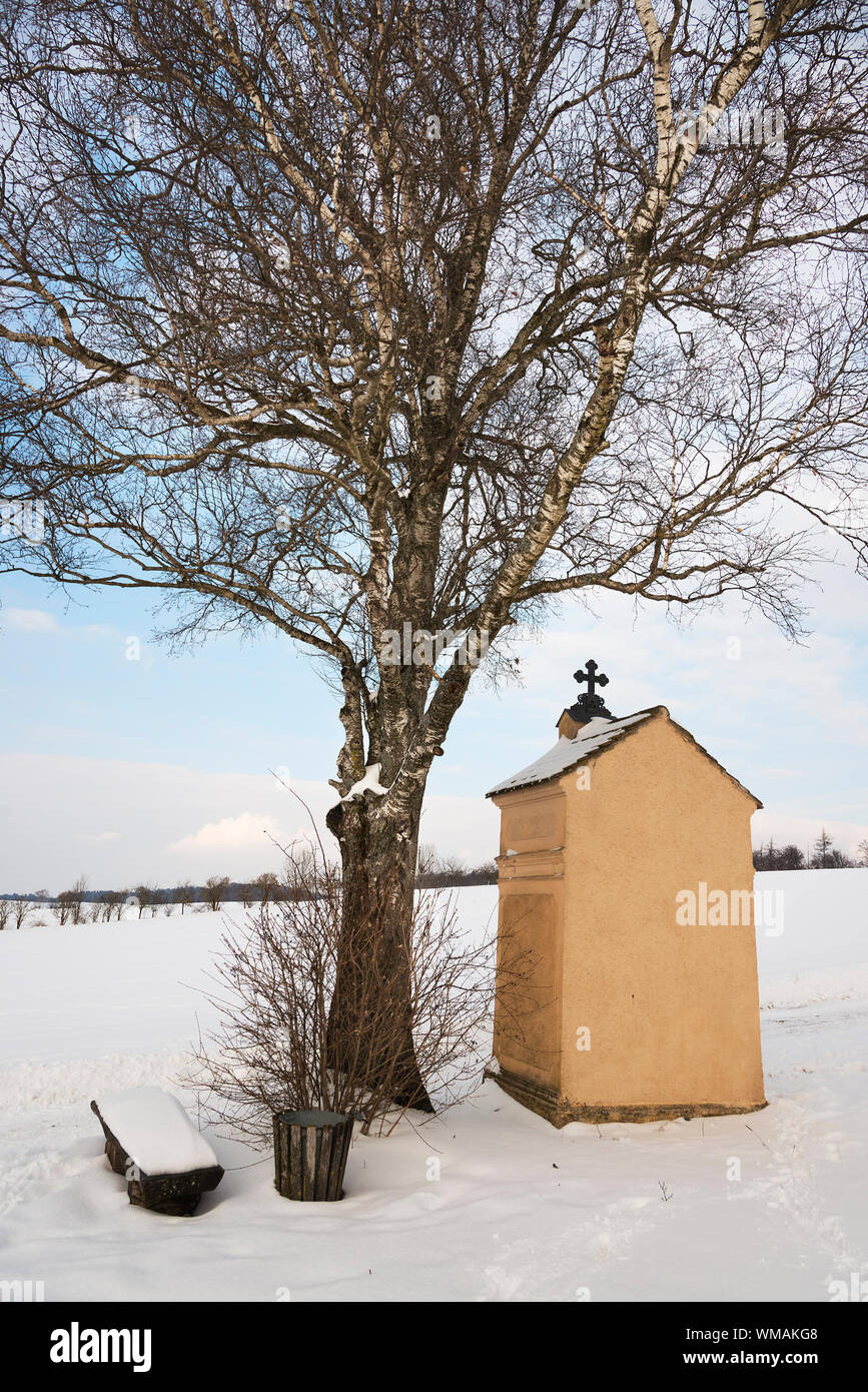 Image of a chapel with tree and snow in winter in Bavaria, Germany ...