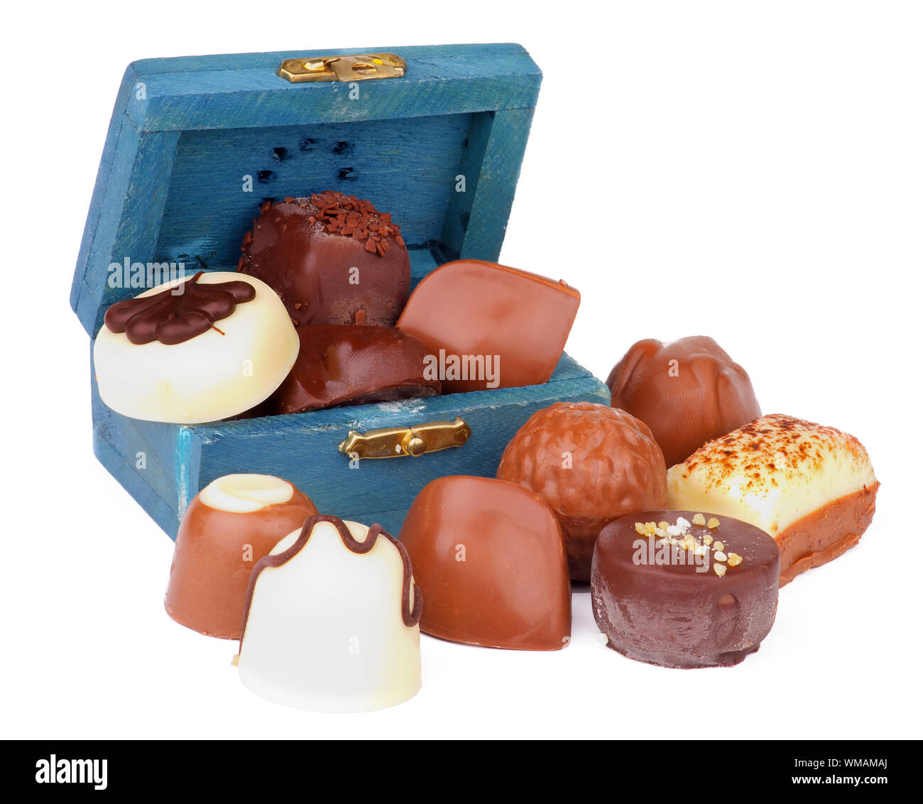 Assortment of Delicious Chocolate Candies and Truffles in Blue Wooden ...