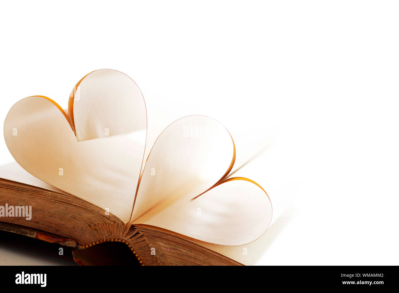 Heart shape made from book pages hi-res stock photography and images ...