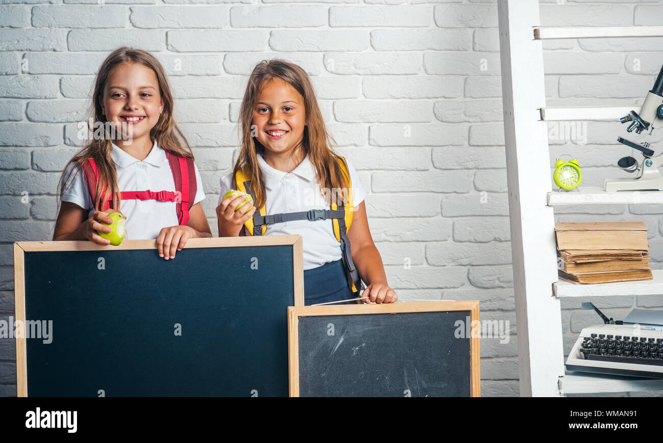 Happy school kids at lesson in september 1. happy children with ...