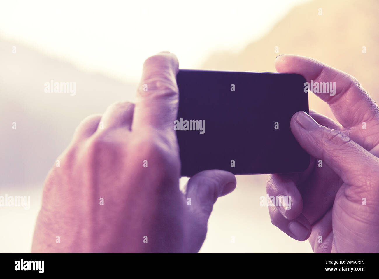 Man Holding a Mobile Phone Stock Photo - Alamy