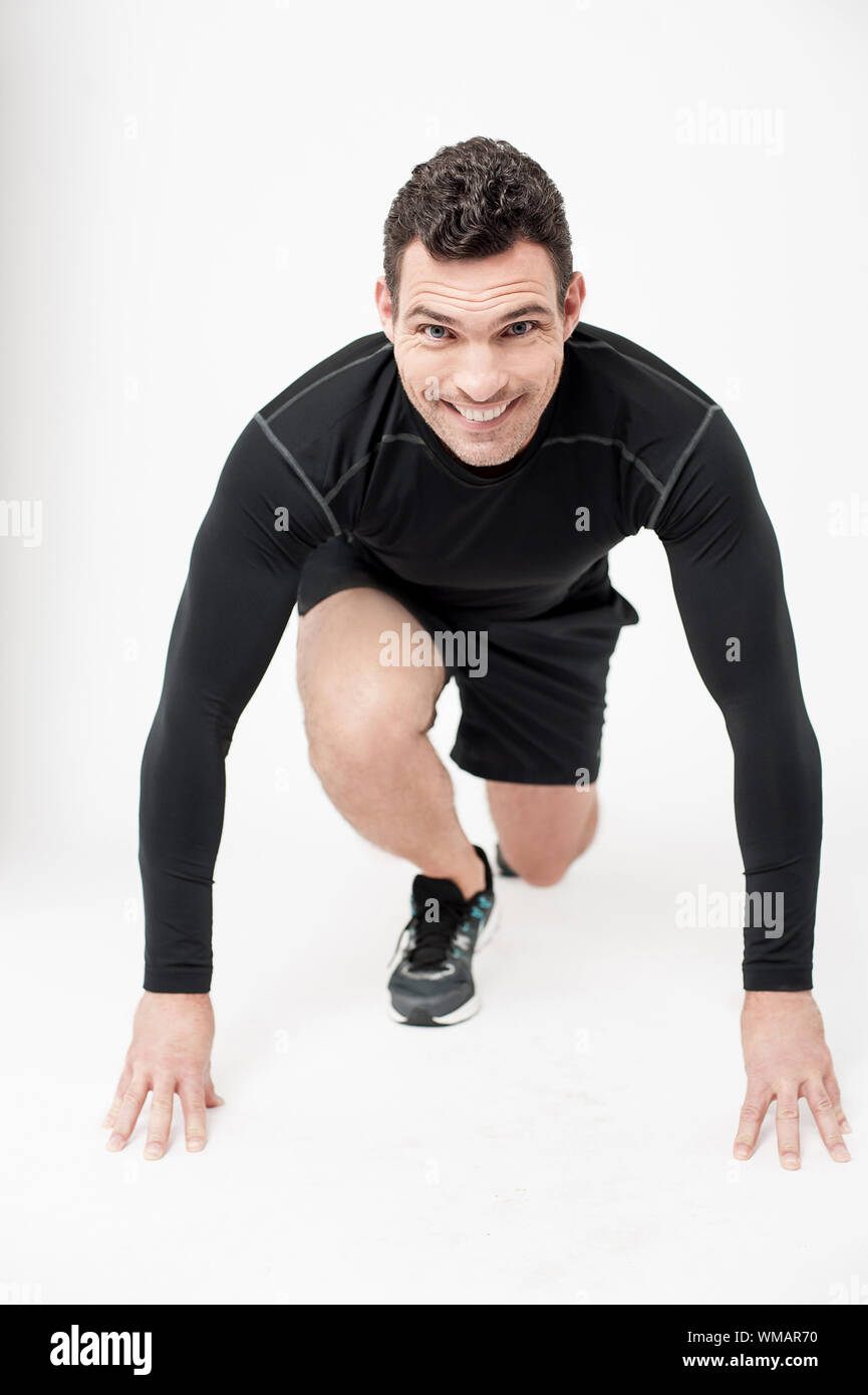 Crouched Position High Resolution Stock Photography and Images - Alamy