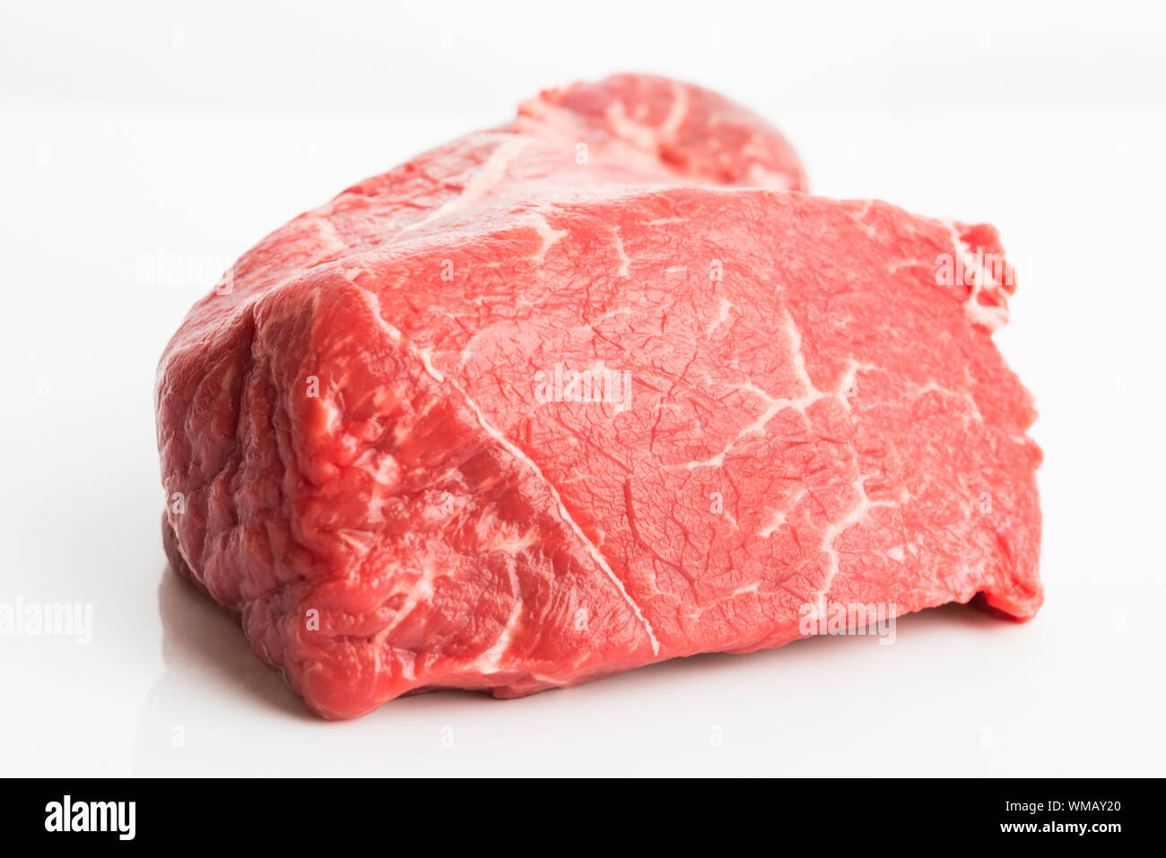 raw beef isolated on white background Stock Photo - Alamy