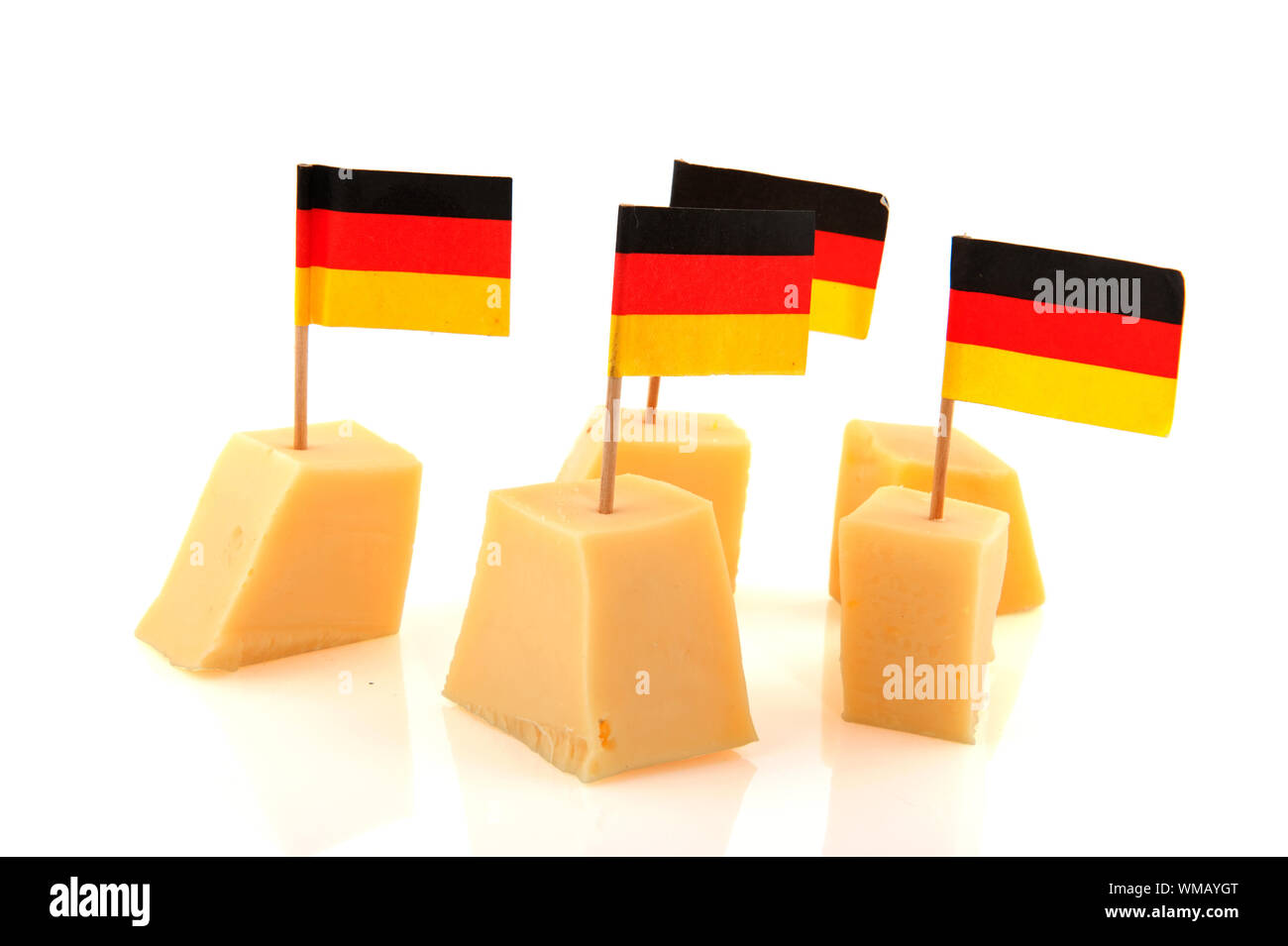 German cubes of cheese with flags isolated over white Stock Photo - Alamy