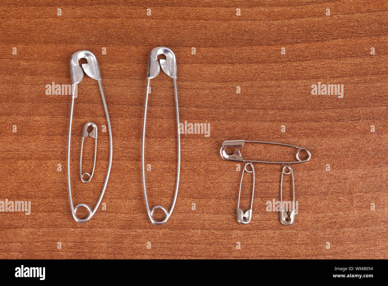 Safety pins hi-res stock photography and images - Alamy