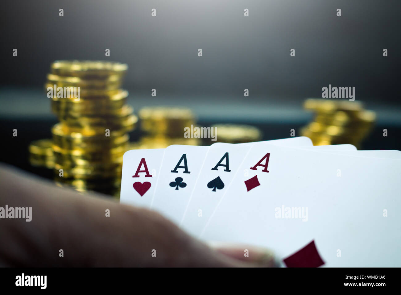 Man holding playing cards hi-res stock photography and images - Alamy