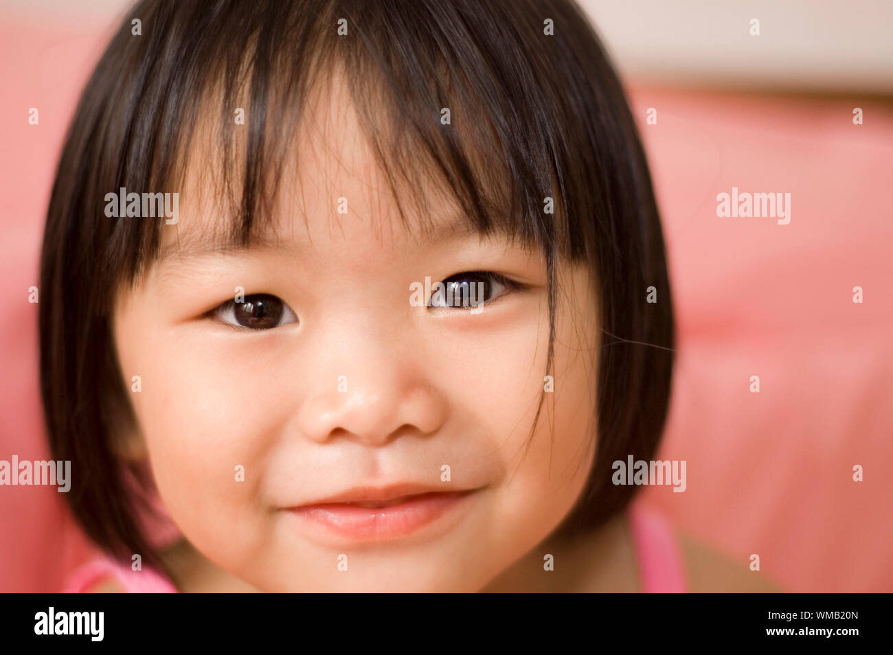little asian girl with smiling face Stock Photo - Alamy