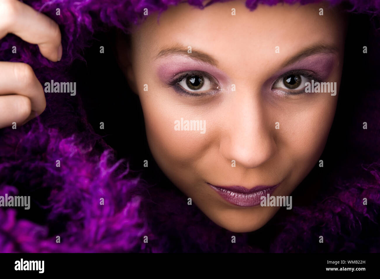 Young woman with a hypnotizing look Stock Photo - Alamy