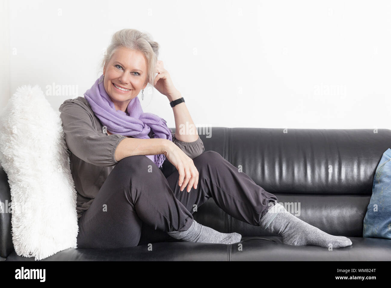 An image of a best age woman relaxing at home Stock Photo - Alamy