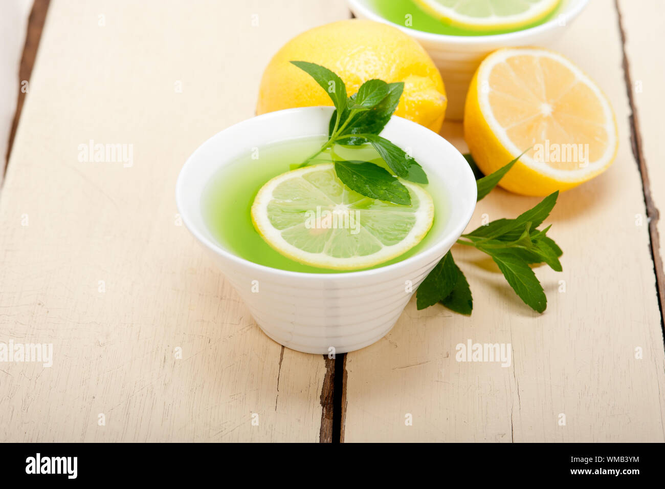 fresh and healthy mint infusion tea tisane with lemon Stock Photo - Alamy
