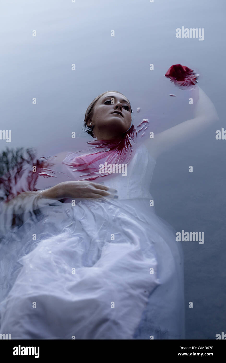 Young woman floating in dead hi-res stock photography and images - Alamy