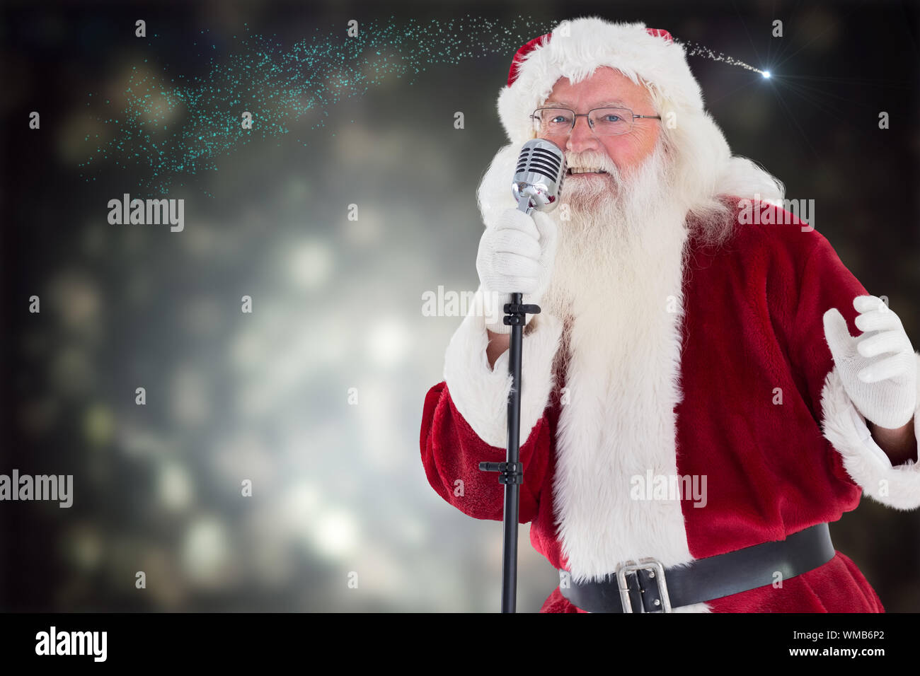 Santa Claus is singing Christmas songs against black abstract light ...