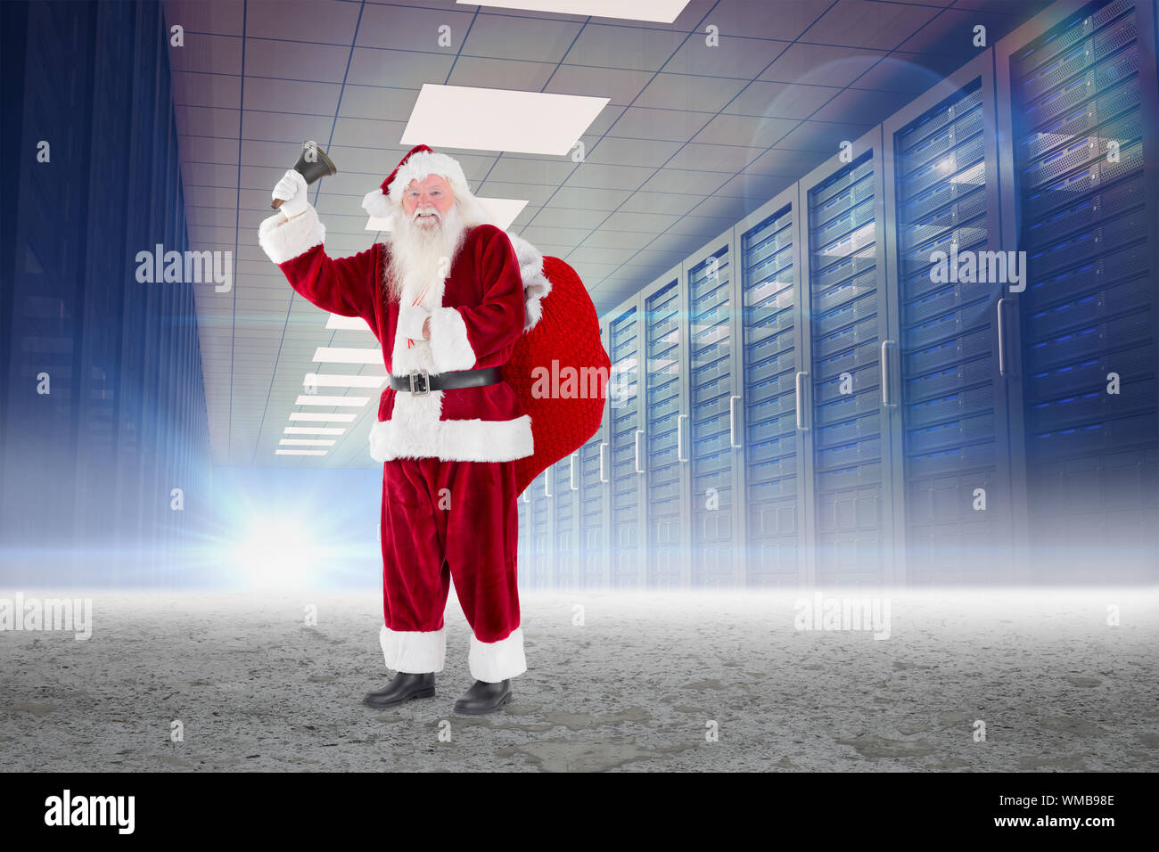 Santa ringing his bell against server hallway in desert setting Stock ...