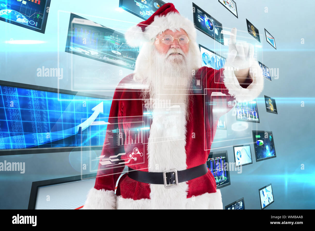 Santa Claus points at something against screen collage showing business ...