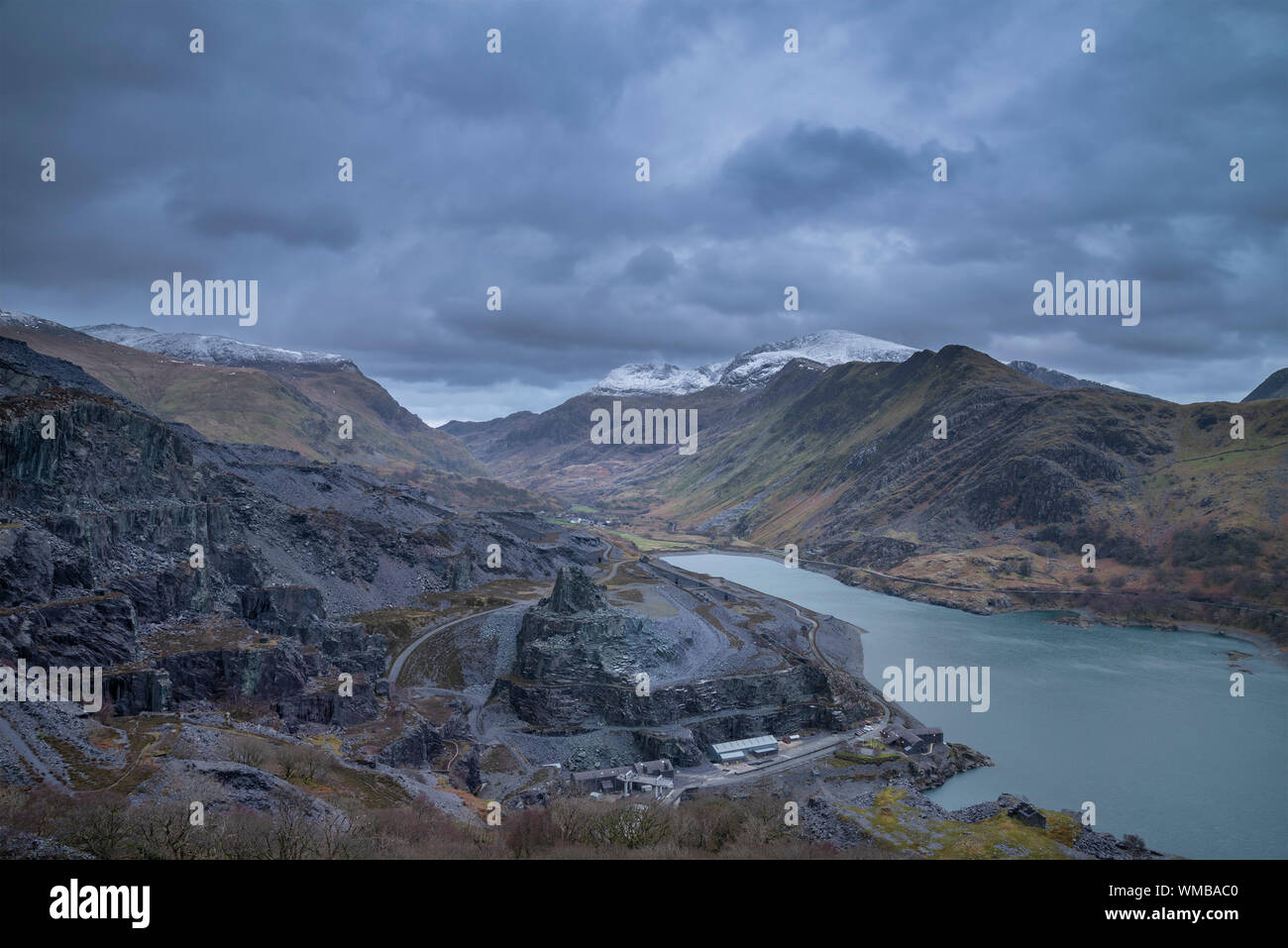 Stunning landscape image of Dinorwig Slate Mine and snowcapped Snowdon ...