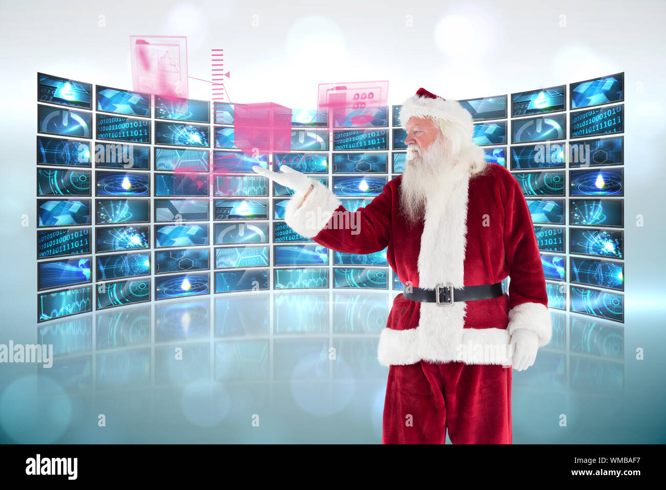 Santa shows something to camera against screen collage showing ...