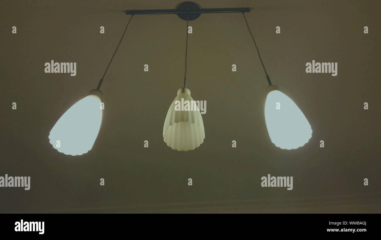Modern hanging lights hi-res stock photography and images - Alamy