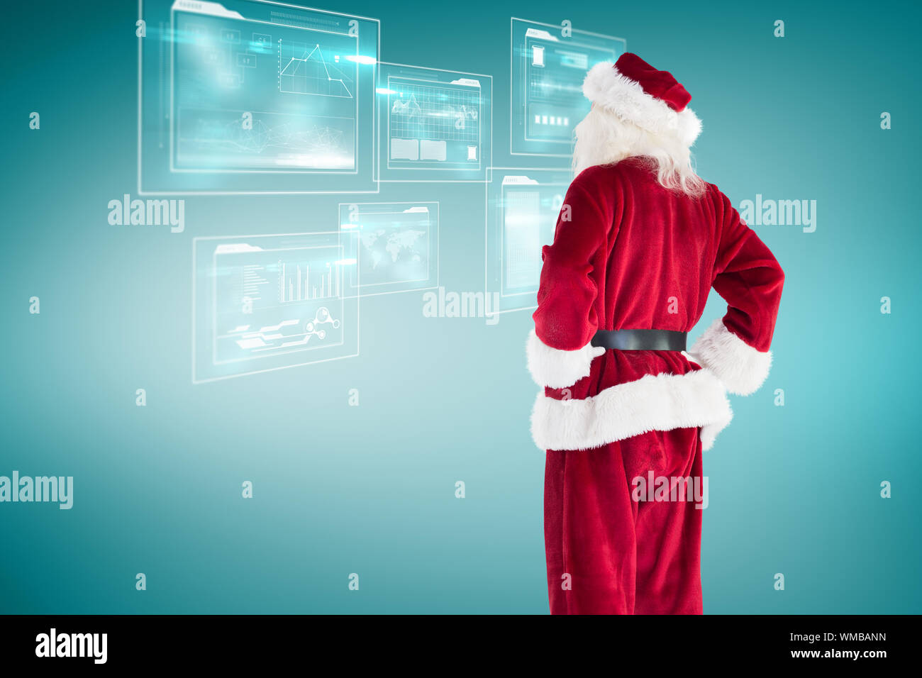 Santa looks away from the camera against blue vignette Stock Photo - Alamy