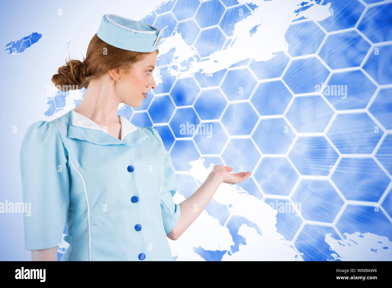 Pretty air hostess presenting with hand against background with europa ...