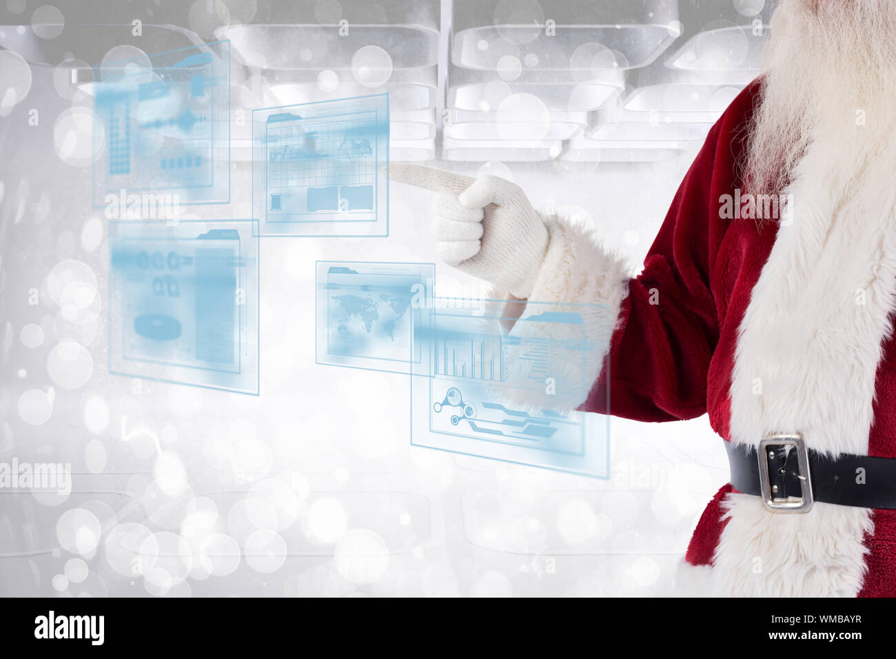 Santa Claus points at something against lights twinkling in modern room ...