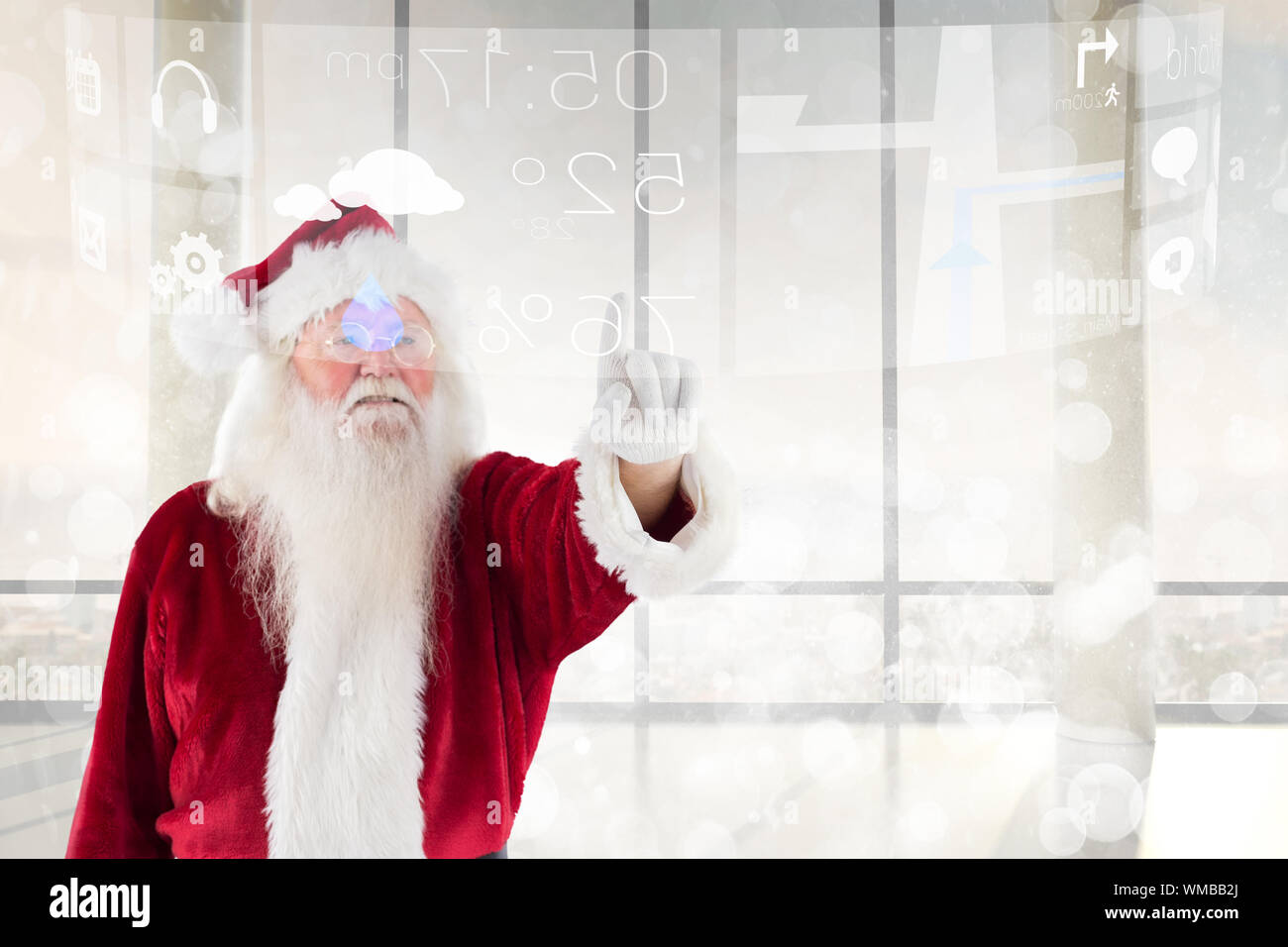 Santa Claus points at something against twinkling lights over room with ...