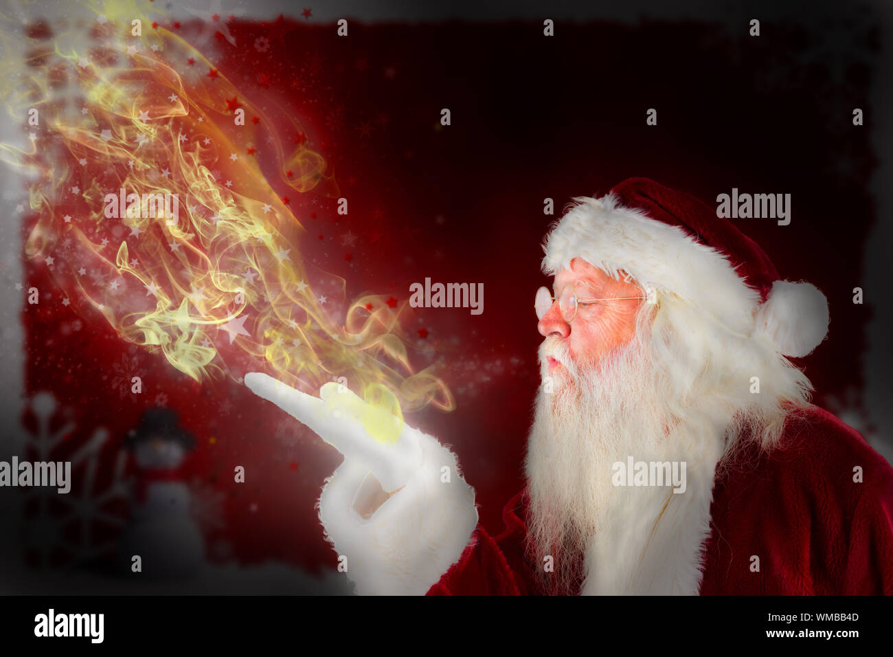 Happy smiling santa claus blowing hi-res stock photography and images ...