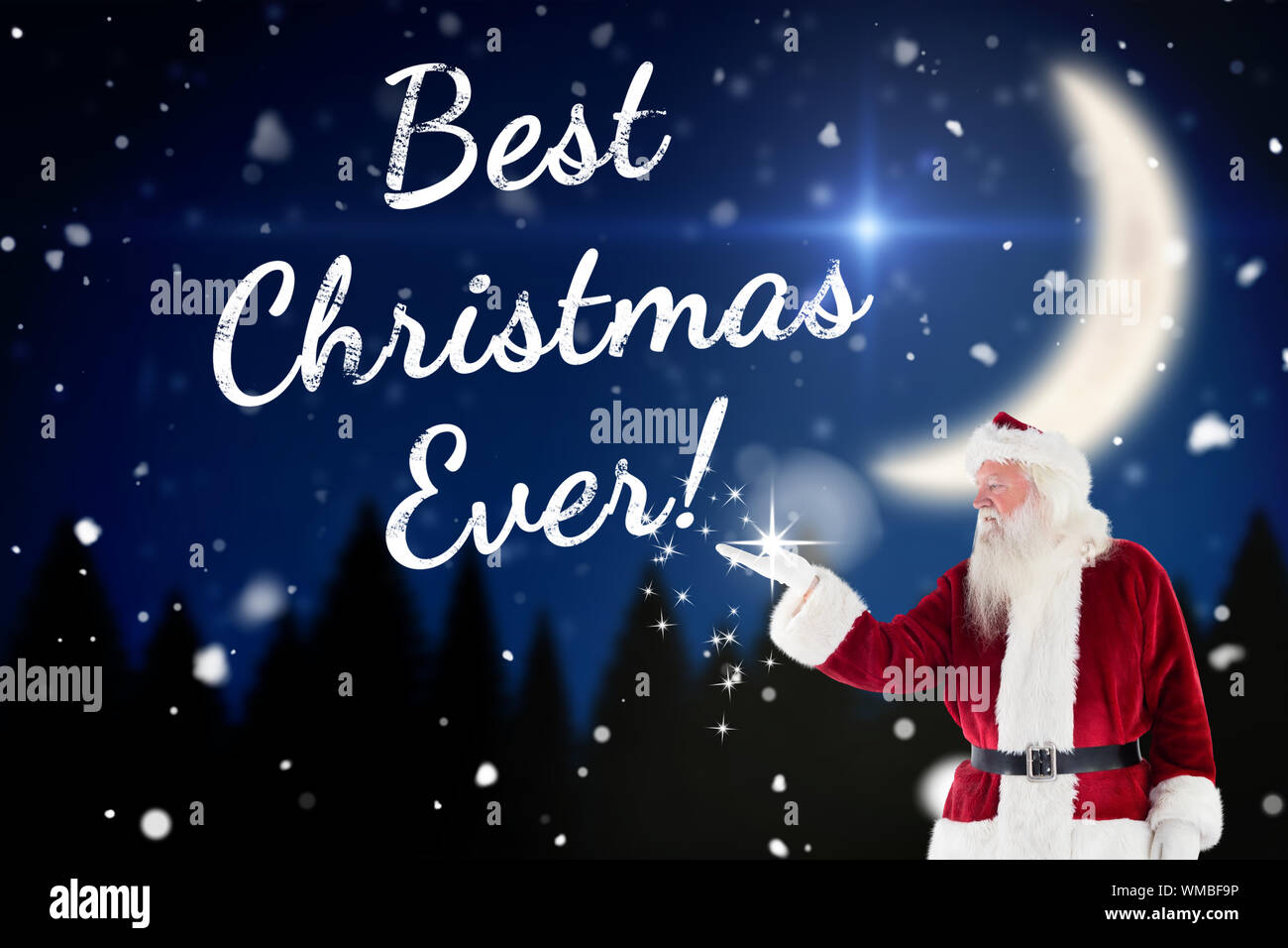 Santa shows something to camera against crescent moon over forest at ...