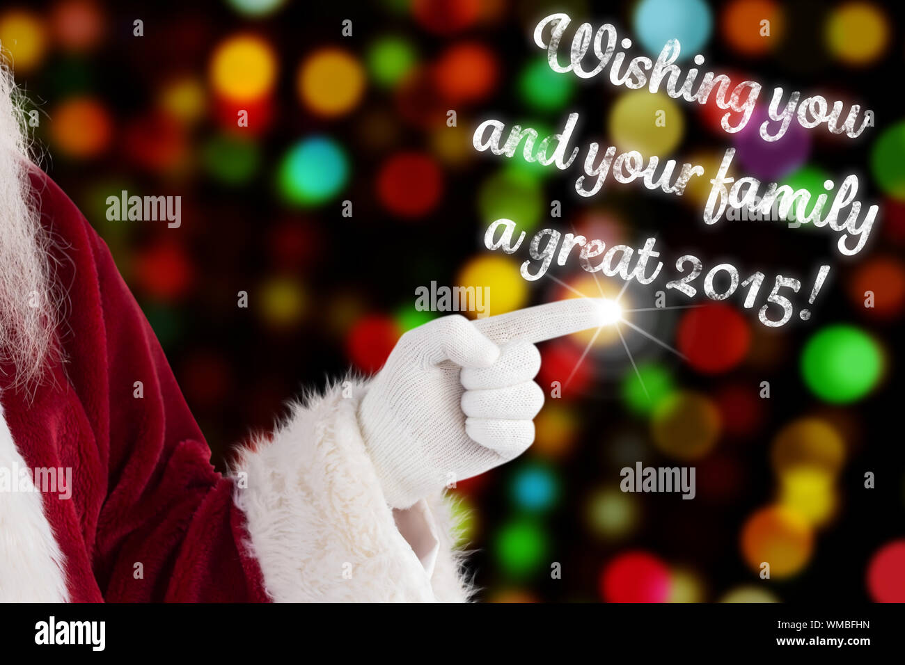 Santa Claus points at something against colourful circles on black ...