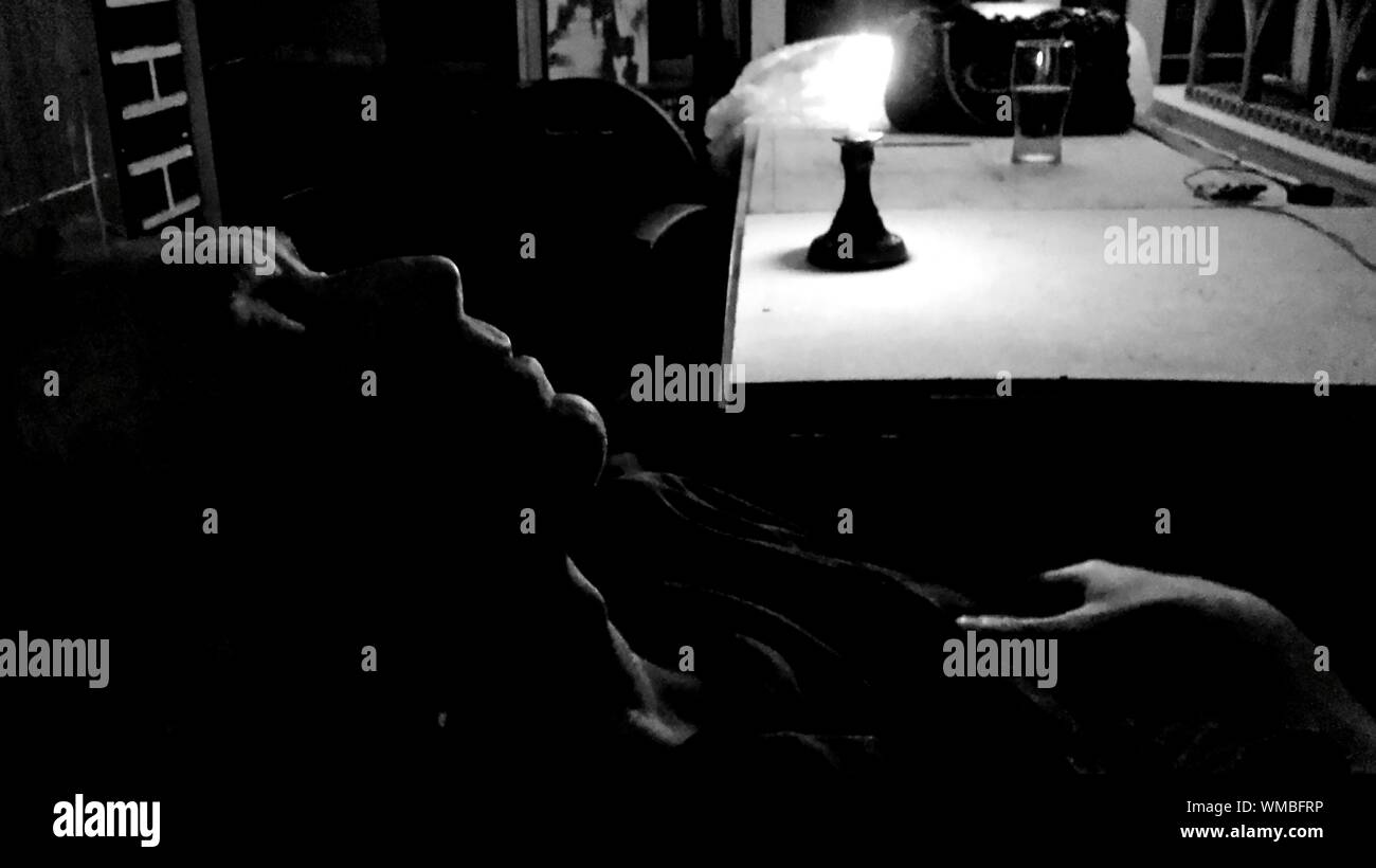 Person in dark room hi-res stock photography and images - Alamy
