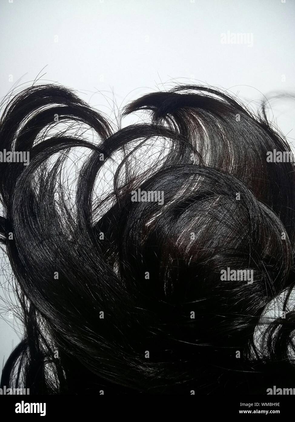 Black messy hair hi-res stock photography and images - Alamy