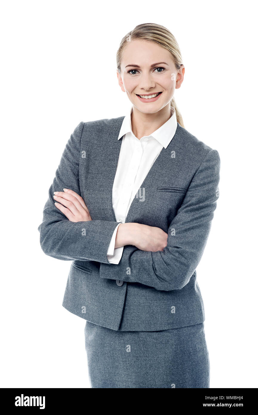 Confident business woman with folded arms Stock Photo - Alamy