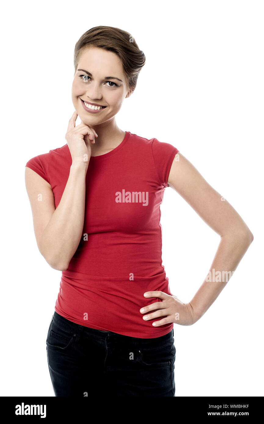 Smiling woman posing with hand on cheek Stock Photo - Alamy