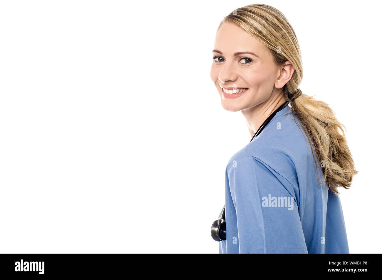 Female physician turning back and looking Stock Photo - Alamy