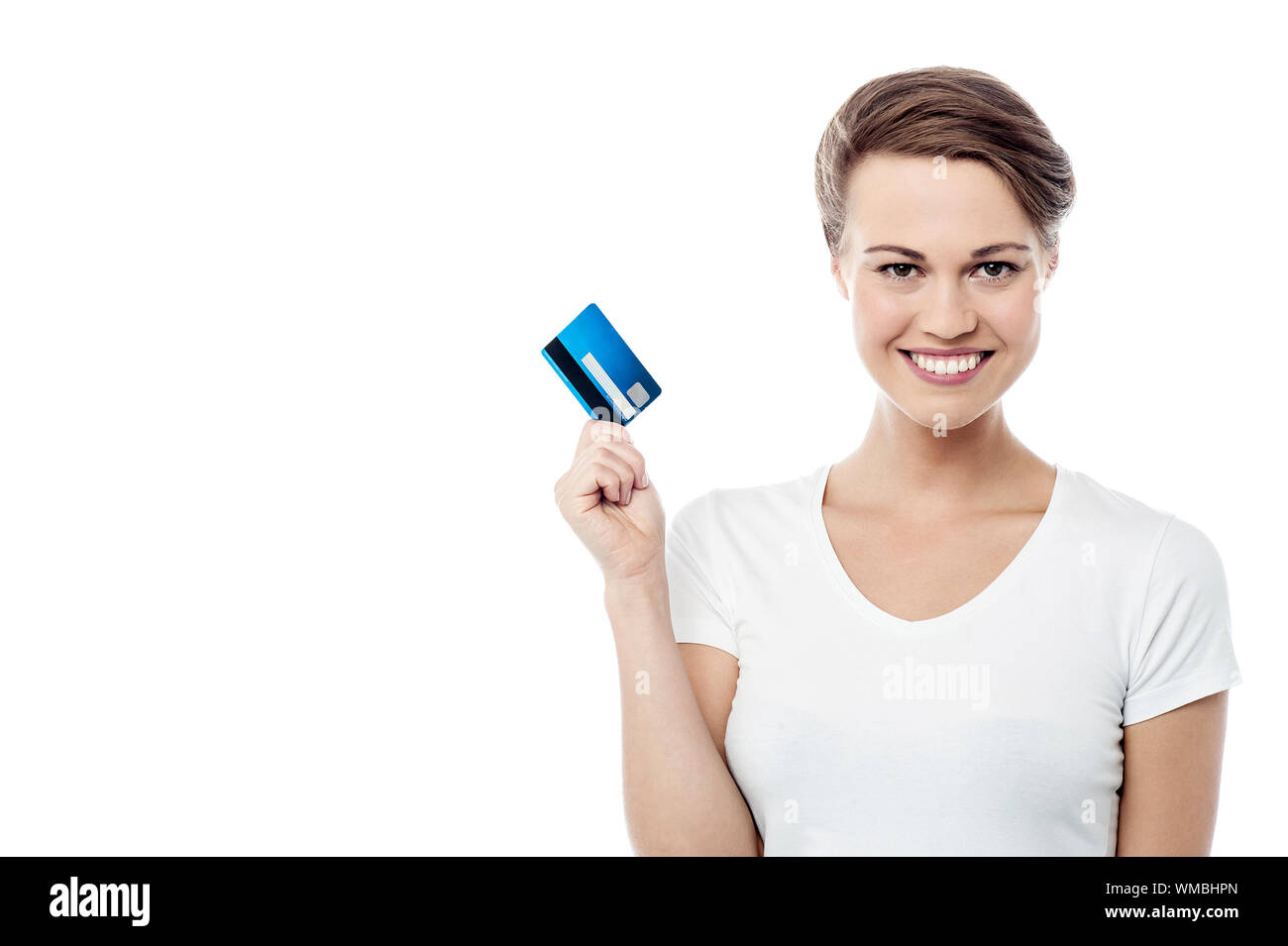 Attractive woman showing her credit card Stock Photo - Alamy