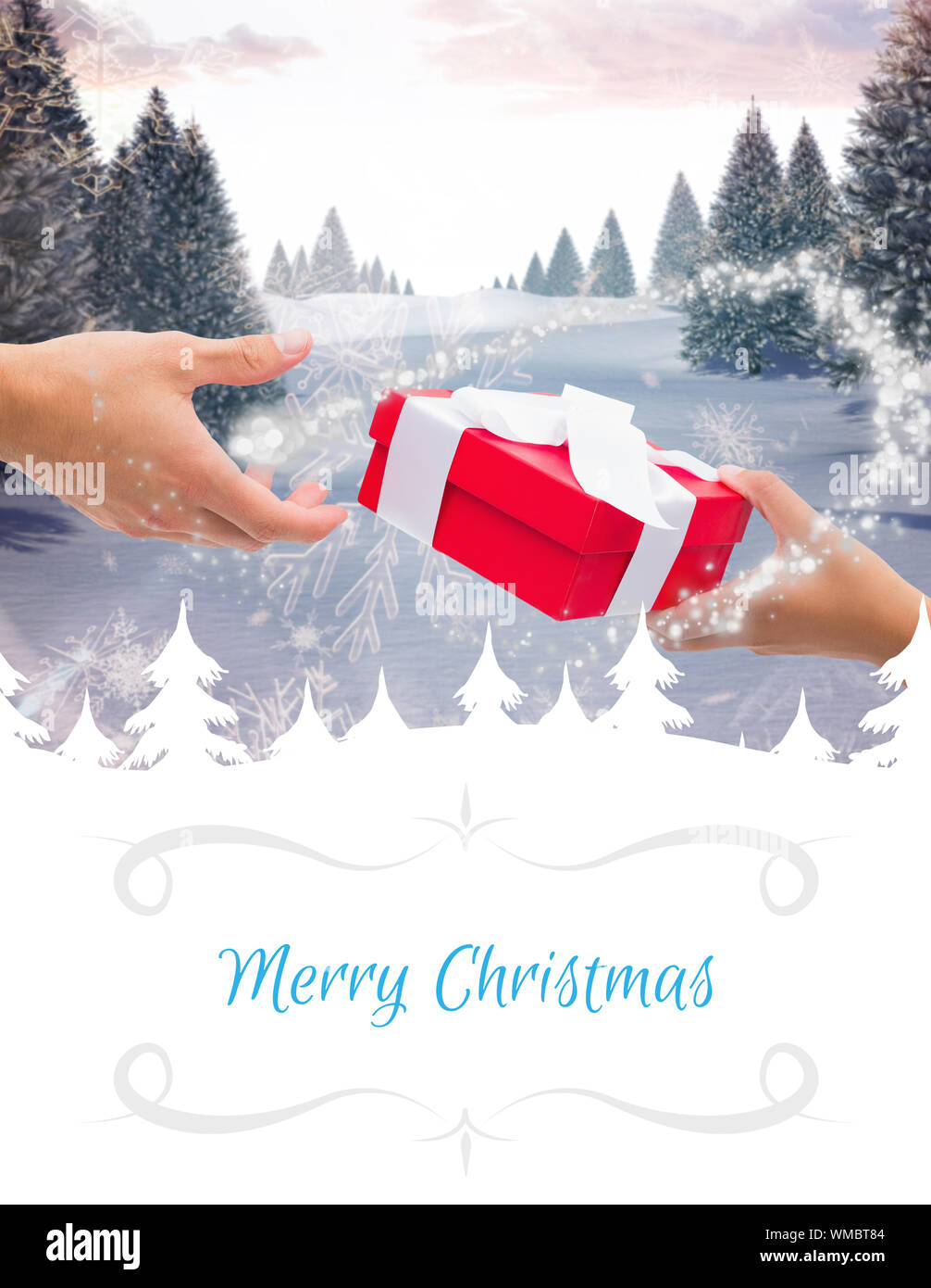 couple passing a wrapped gift against border Stock Photo - Alamy