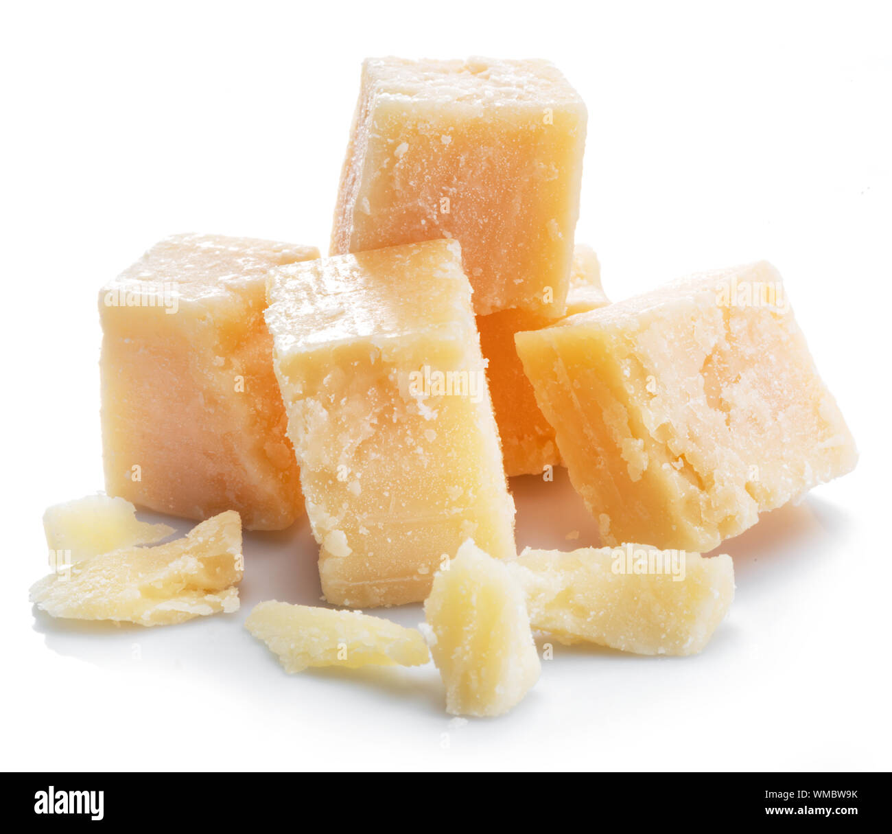 Parmesan cheese cubes isolated on white background Stock Photo - Alamy