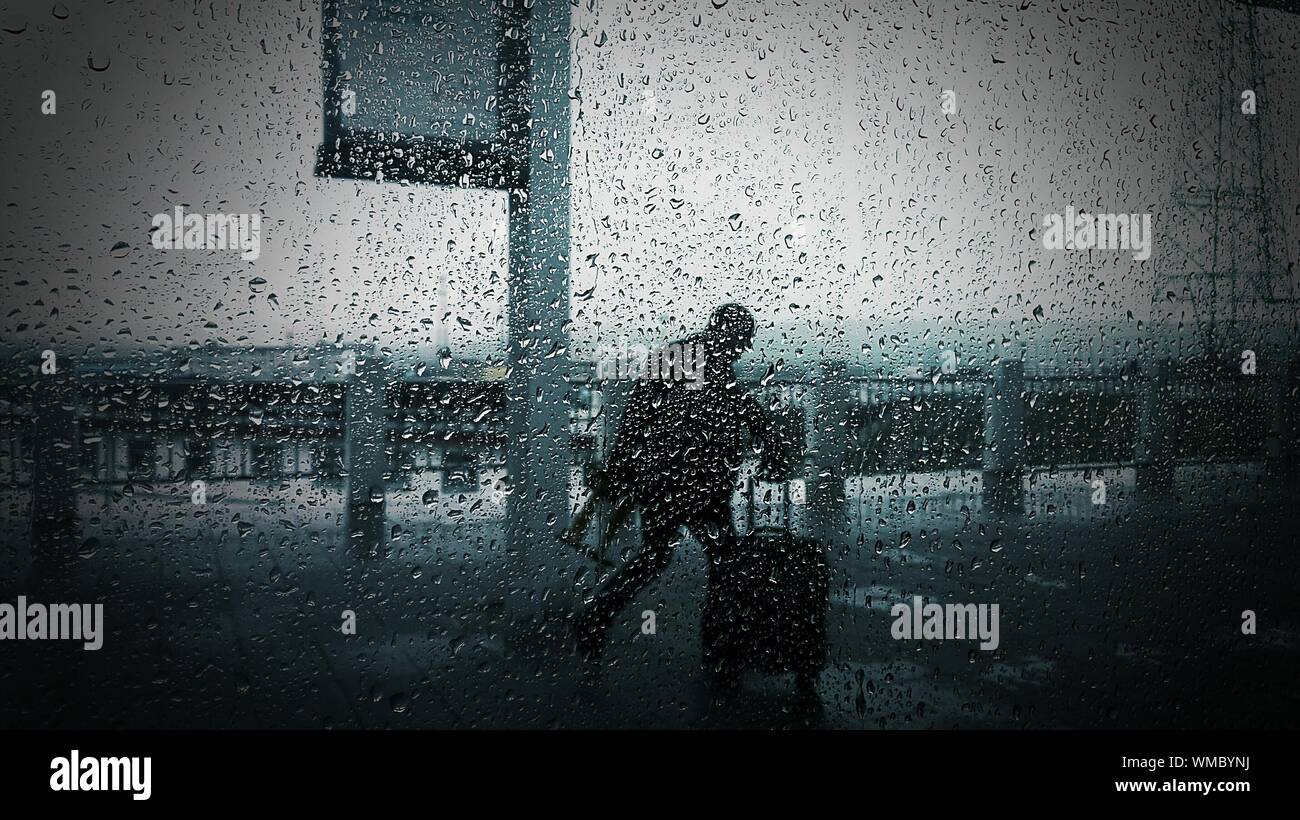 Person window storm hi-res stock photography and images - Alamy