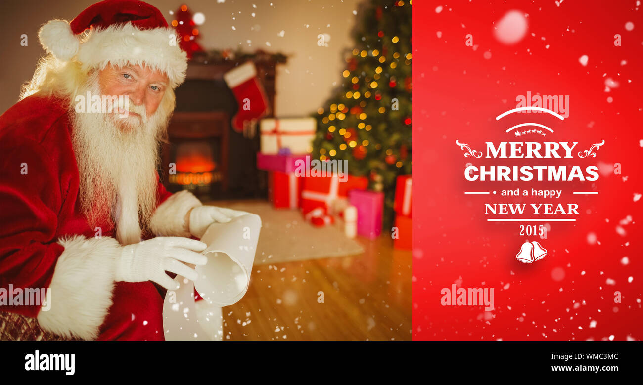 Happy santa claus holding scroll hi-res stock photography and images ...