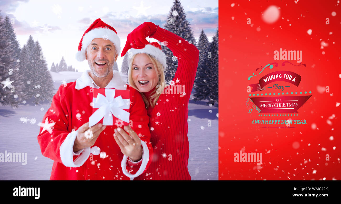 festive couple against red vignette Stock Photo - Alamy