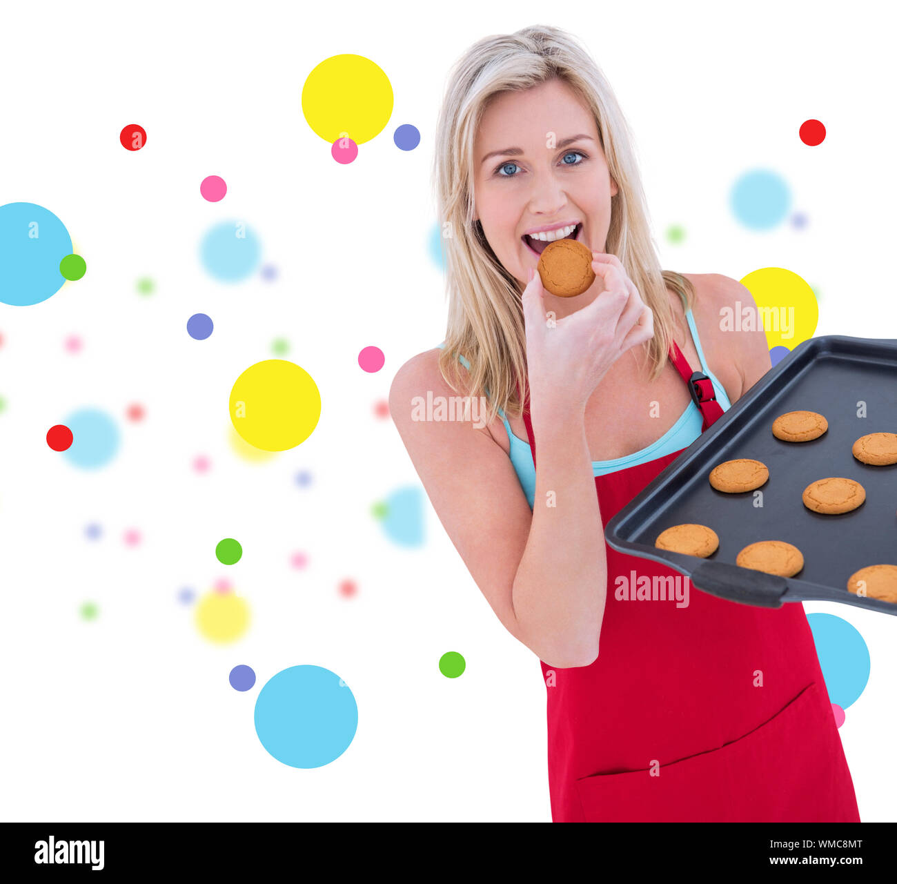 Blonde woman eating cookie hi-res stock photography and images - Alamy