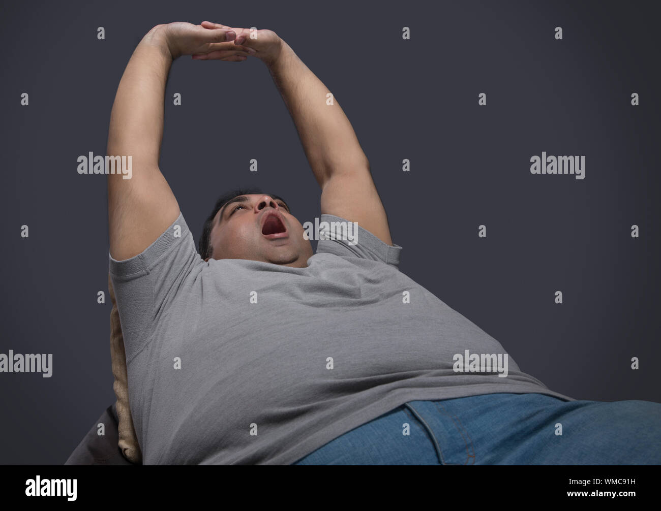 Fat man on chair hi-res stock photography and images - Alamy