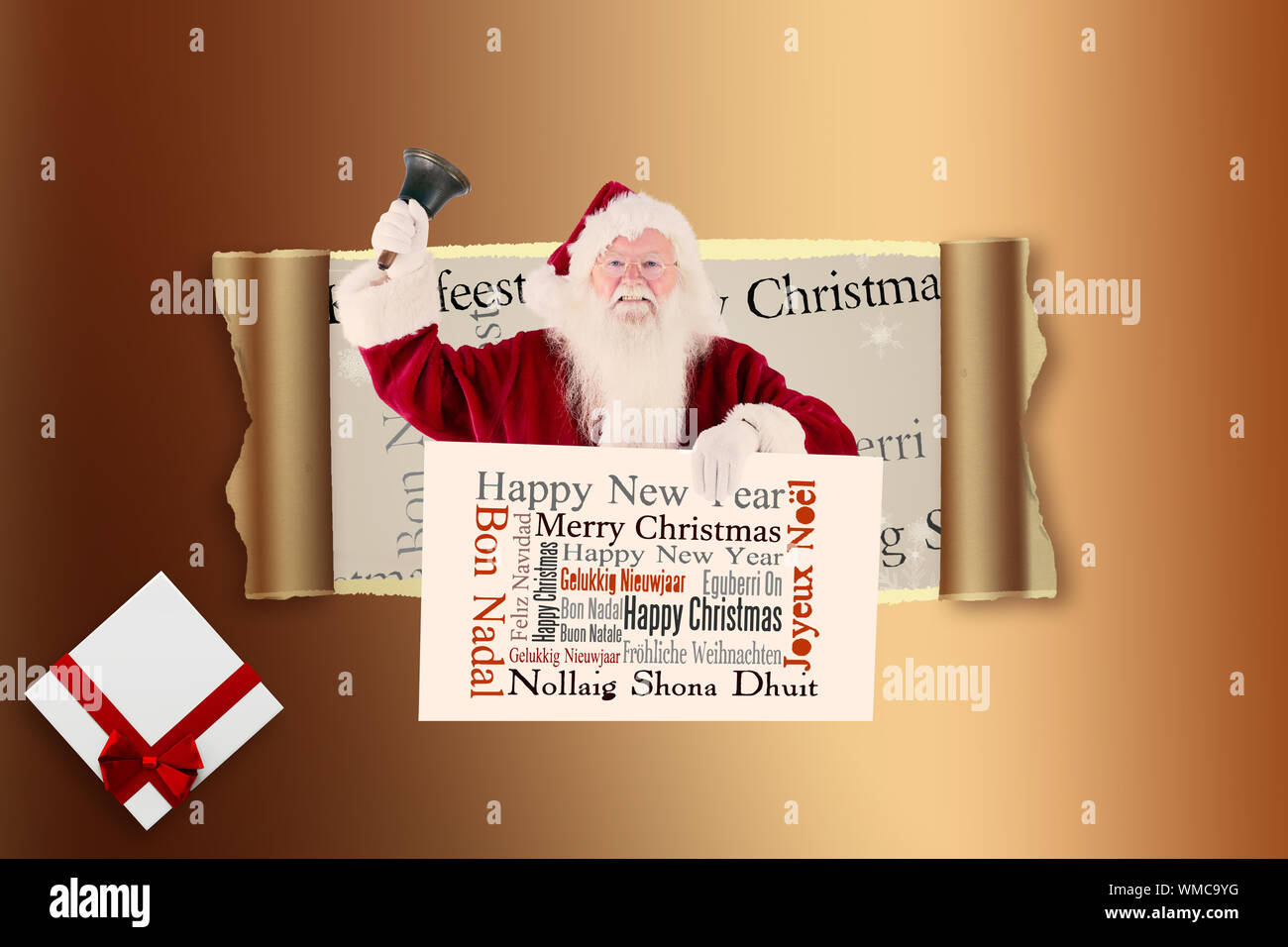 Santa holds a sign and rings his bell through rip in gold paper Stock ...