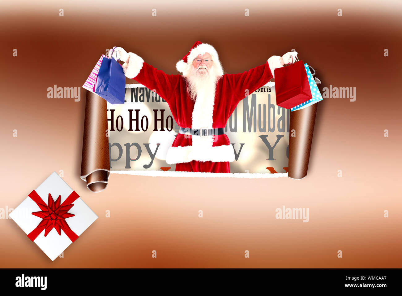 Santa holds some bags for Chistmas through rip in gold paper Stock ...