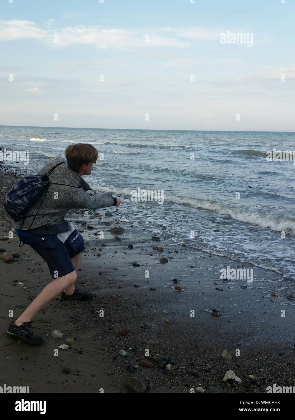 Throwing Stone Into Sea High Resolution Stock Photography and Images ...