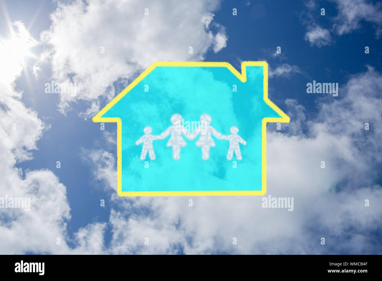 Cloud in shape of family against bright blue sky with clouds Stock ...