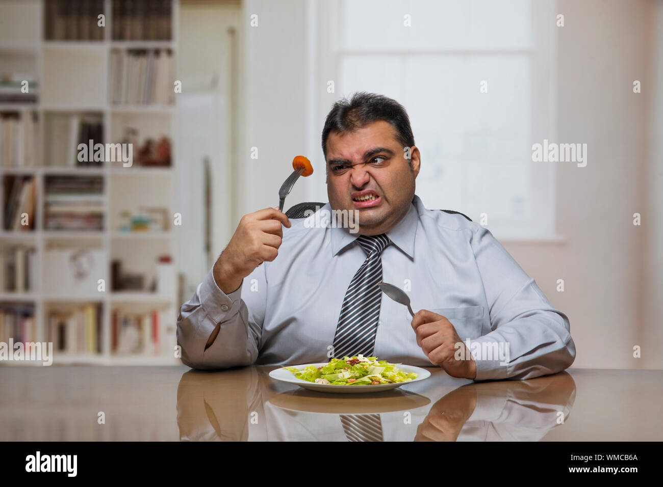 Fat man table hi-res stock photography and images - Alamy